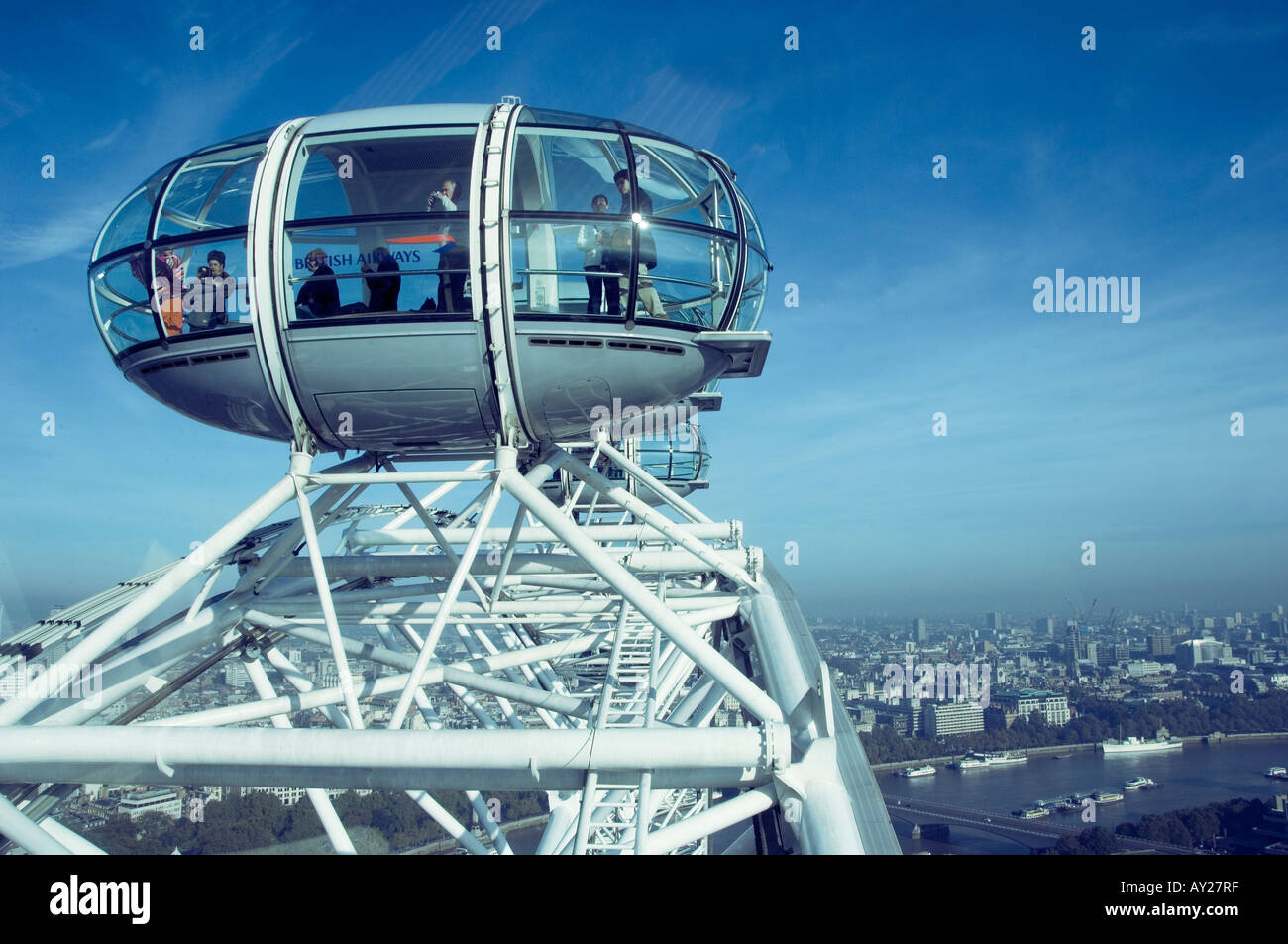 A pod at the top the London Eye with blue sky and view of the city of ...