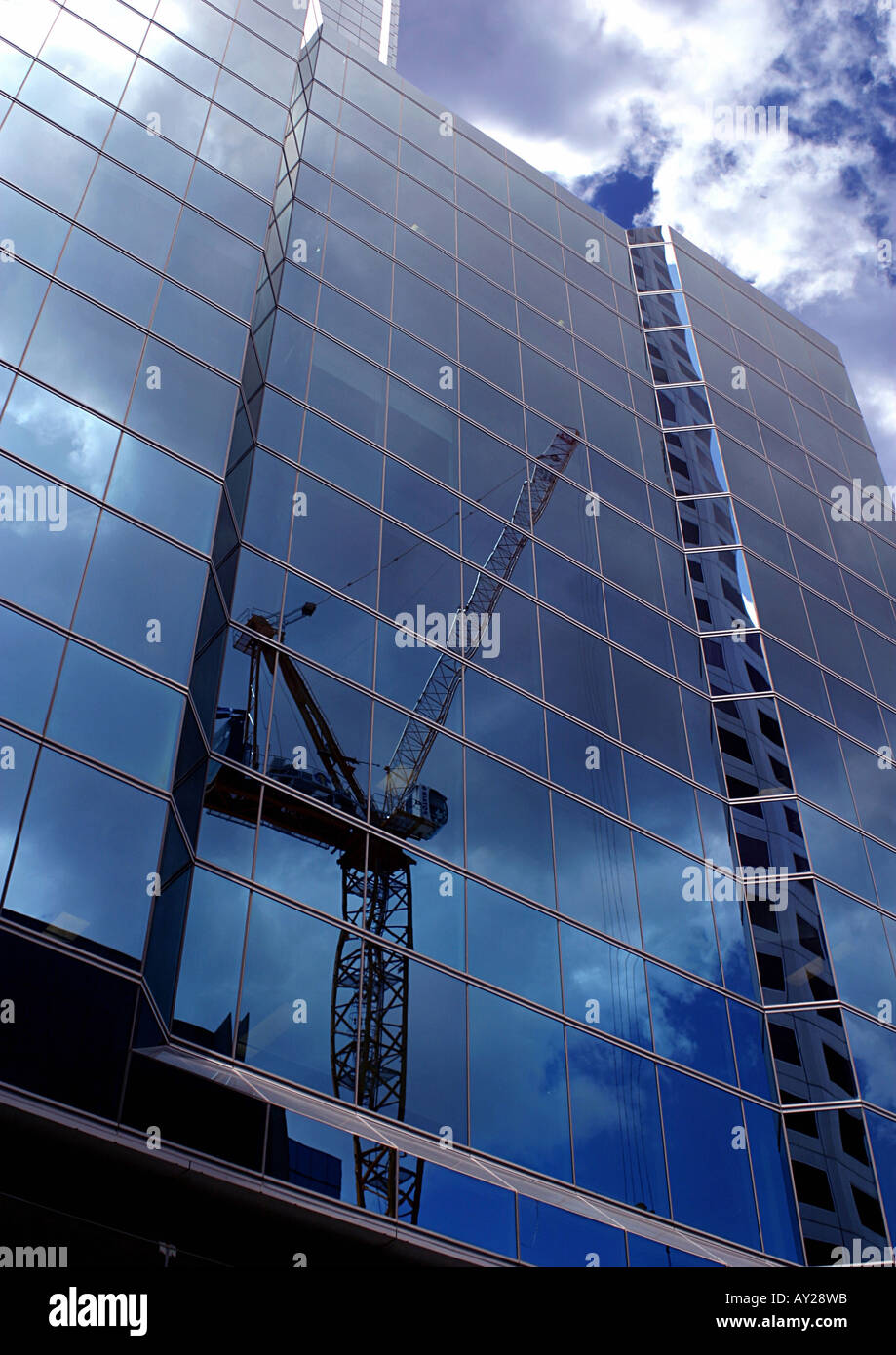 High rise building with crane reflection Perth Australia Stock Photo ...