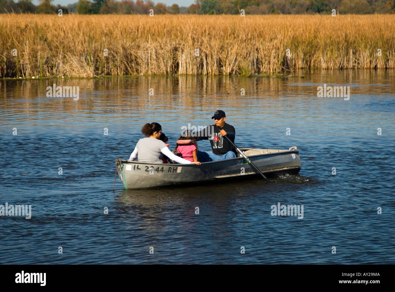 Dad Rowing Family Backwards Stock Photo - Alamy