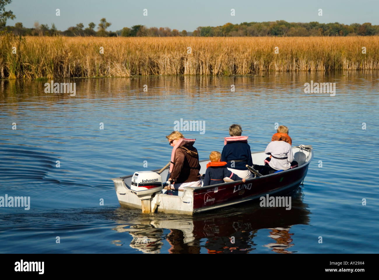 Family Boating on Lake Stock Photo - Alamy