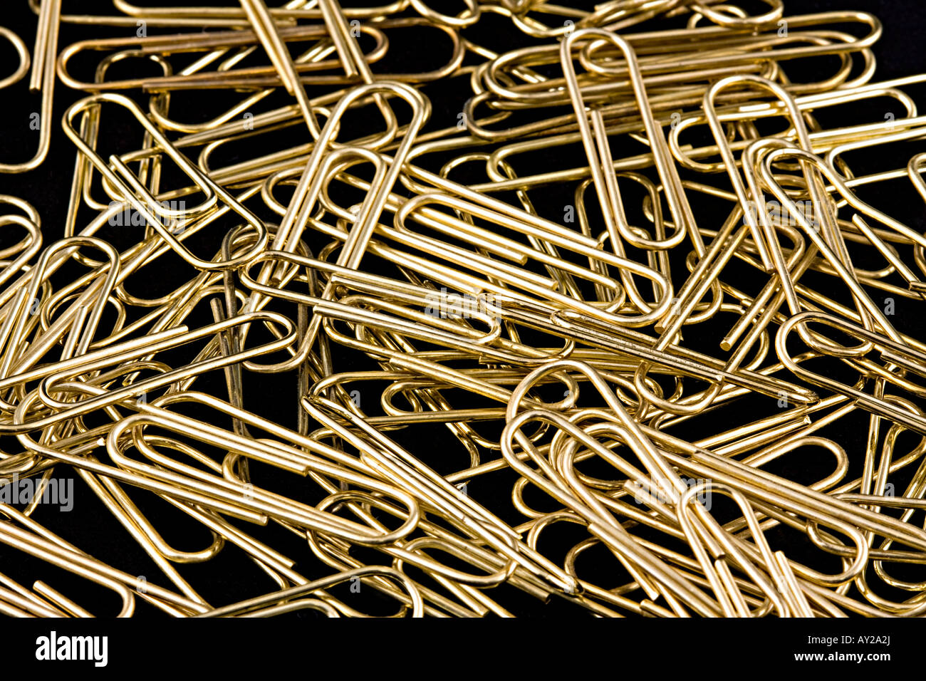 Gold paperclips hi-res stock photography and images - Alamy