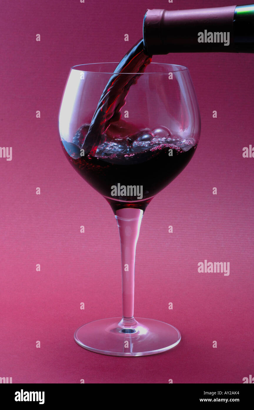 Pouring wine 2 Stock Photo - Alamy