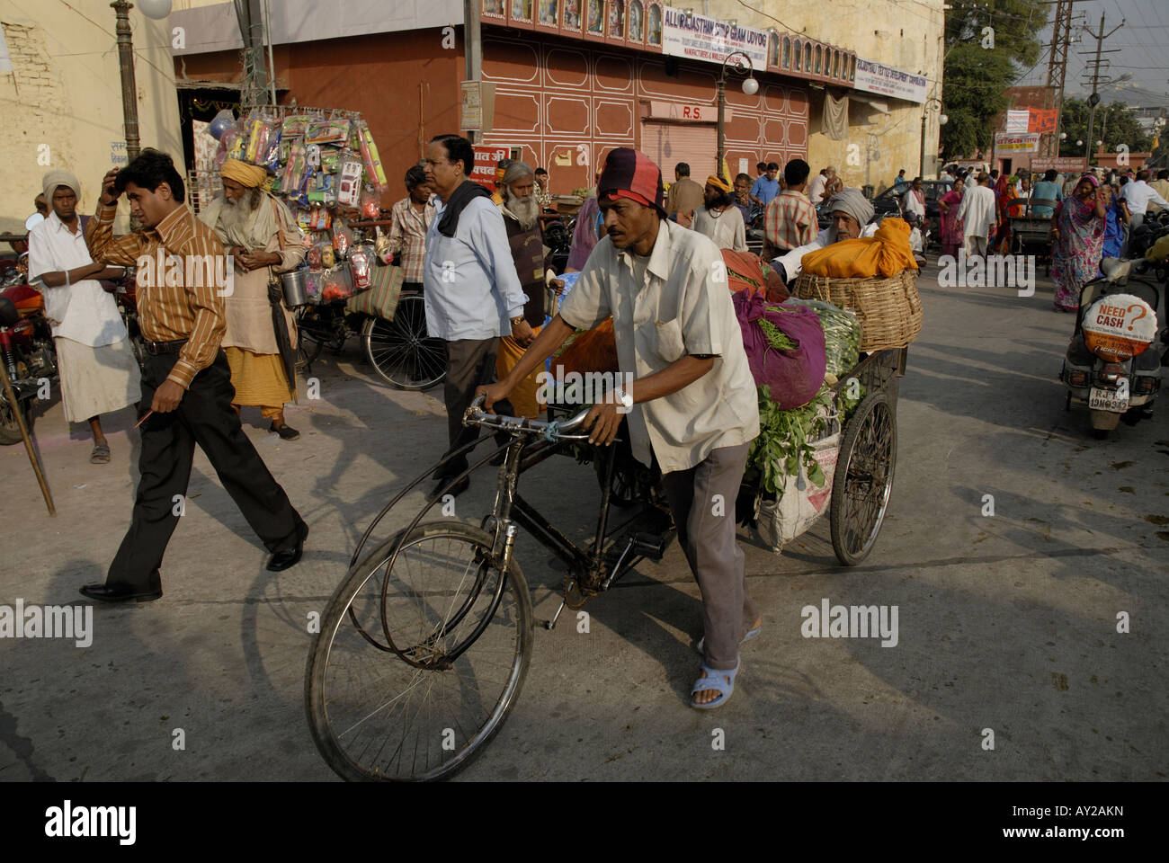 Man with loaded rickshaw in a market in Jaipur Rajasthan India Stock ...