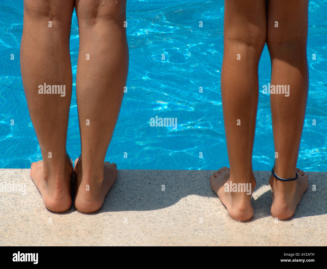 Pair bronzed legs hi-res stock photography and images - Alamy