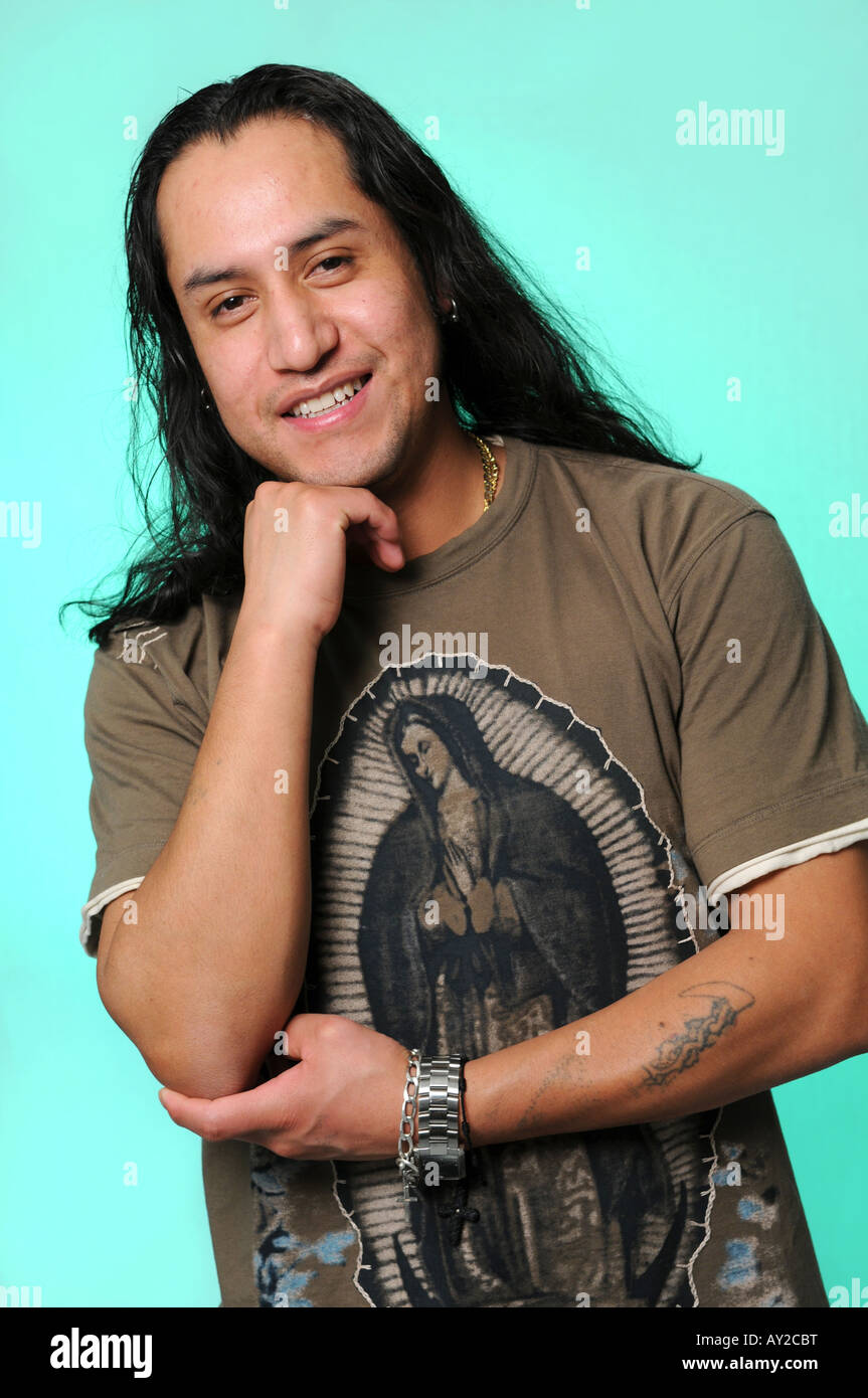 Portrait of young Mexican smiling Stock Photo - Alamy