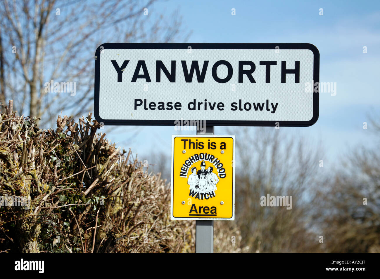 Village Name Sign and Neighbourhood Watch Sign Stock Photo - Alamy