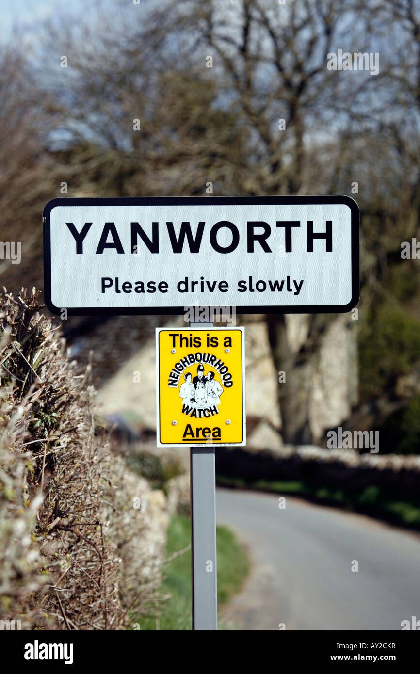 Village Name Sign and Neighbourhood Watch Sign Stock Photo - Alamy