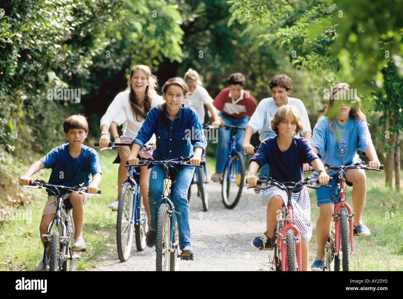 MR GROUP OF CHILDREN AND TEENAGERS RIDING BIKES Stock Photo - Alamy