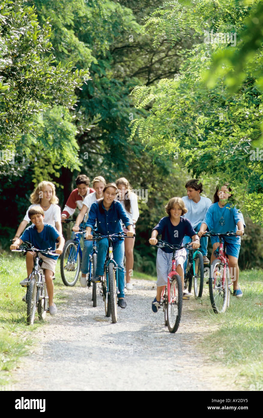 Group children playing bike hi-res stock photography and images - Alamy