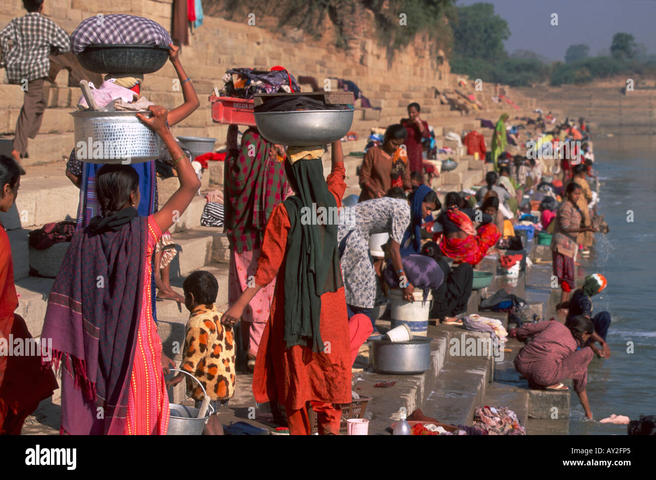 Women washing clothing in a tank, Sarkhej outside of Ahmedabad in the ...