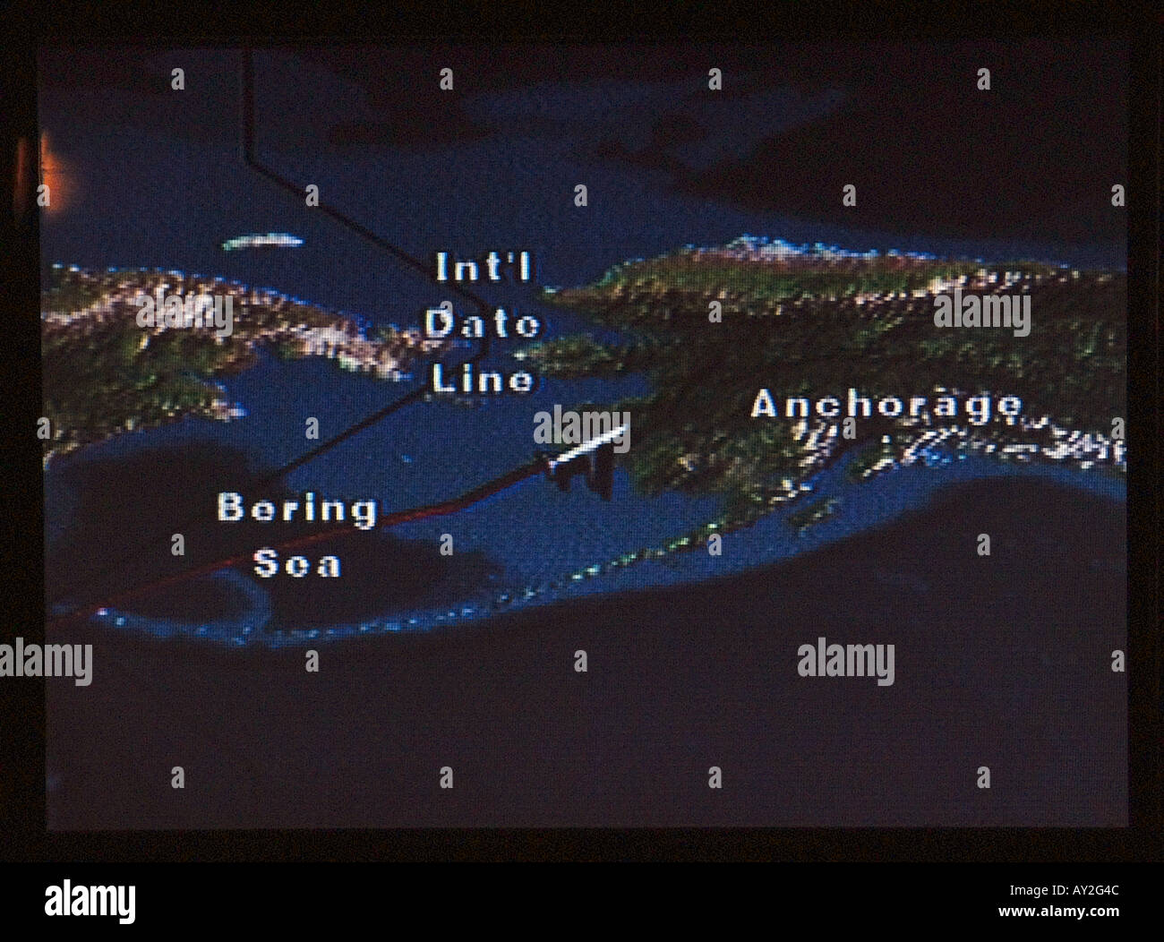 Flight progress map in airline over Alaska United States Stock Photo ...