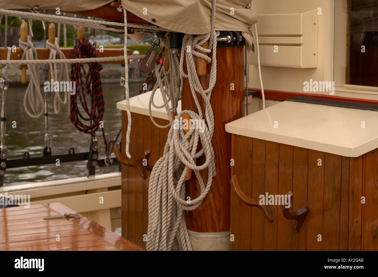 the interior view of a sailing ship with the lines and ties coiled and ...