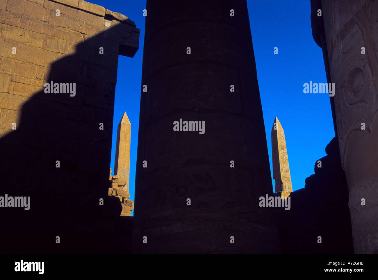 Karnak temple with two obelisks near modern Luxor, Egypt Stock Photo ...