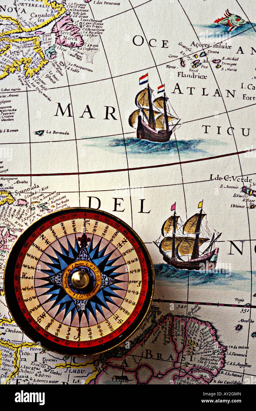 Old compass on old map Stock Photo - Alamy
