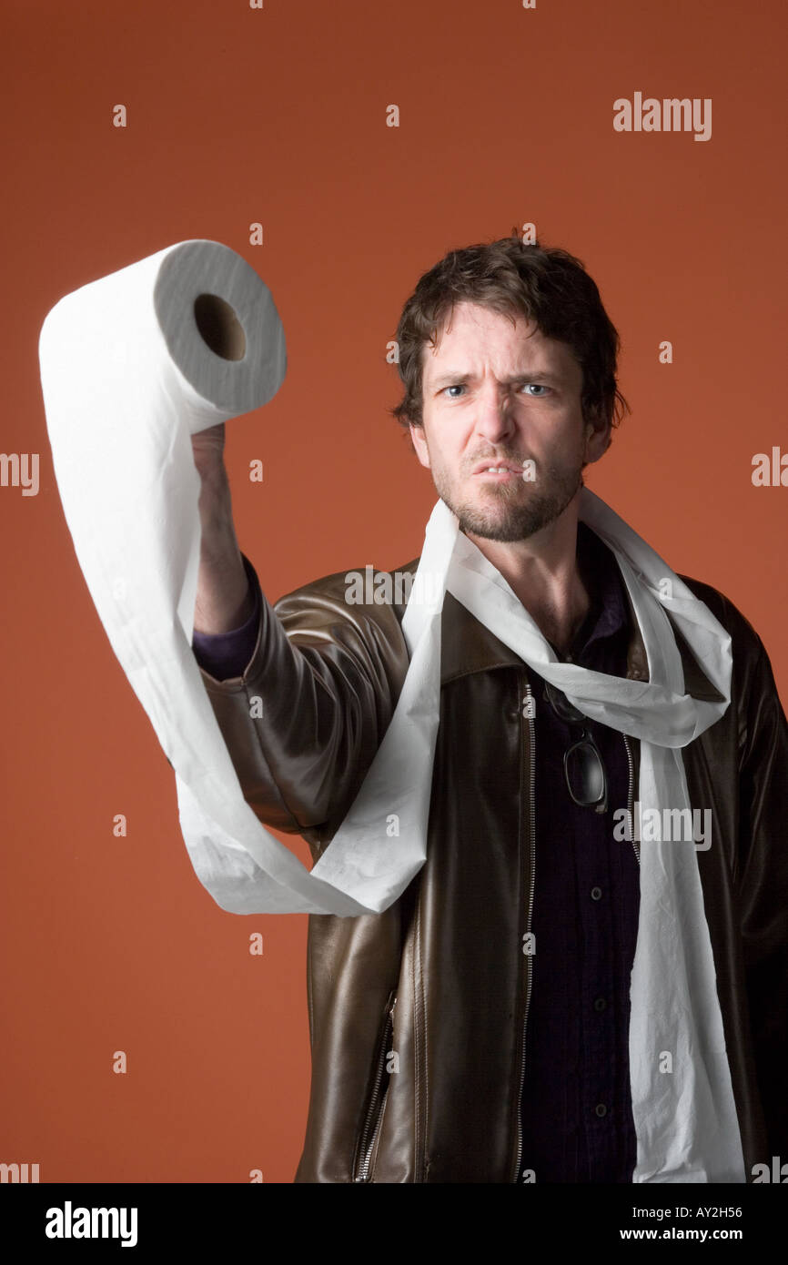 Portrait Caucasian man wrapped in toilet paper Stock Photo - Alamy