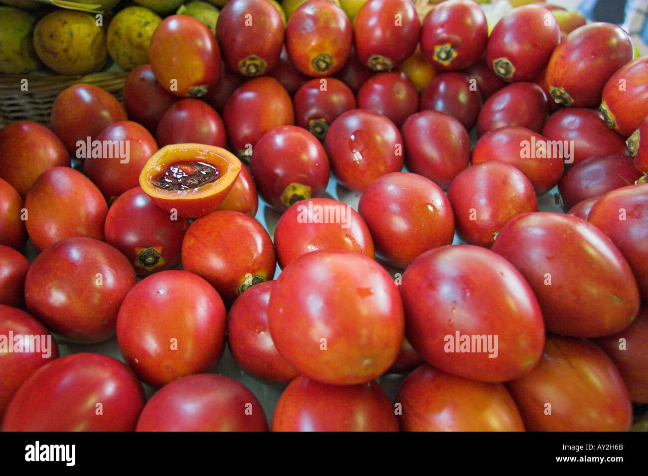 Display of Tomato Passion Fruit on a market stall at the Mercado dos ...