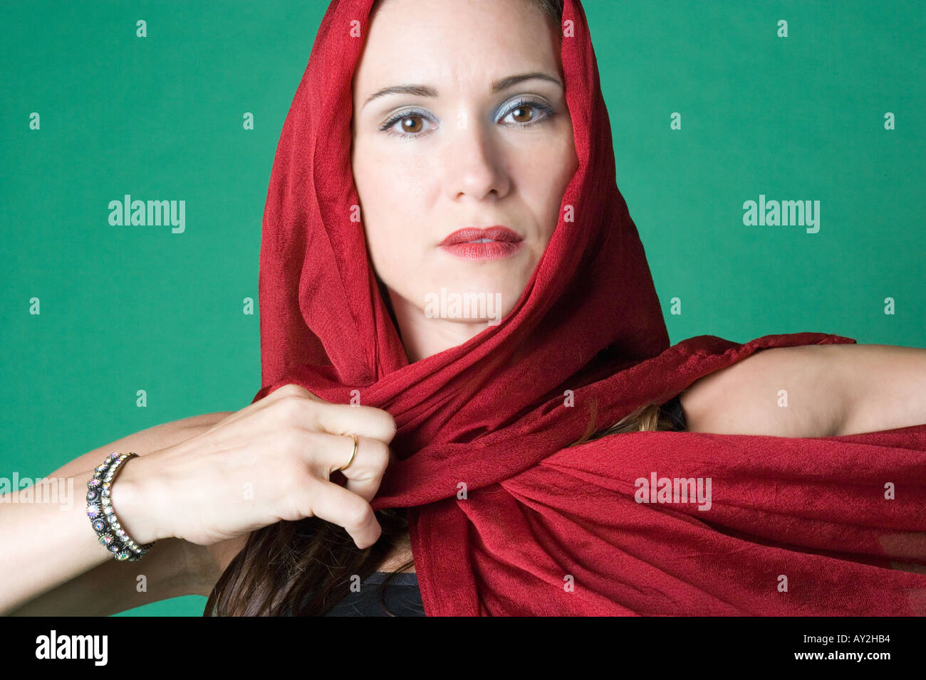 Woman wearing red shawl hi-res stock photography and images - Alamy