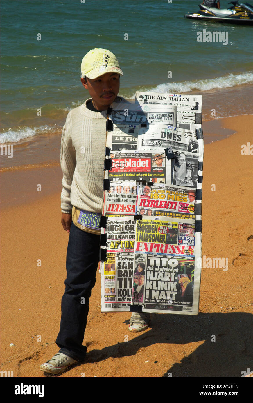 Newspaper vendor at Patthaya, Thailand Stock Photo - Alamy