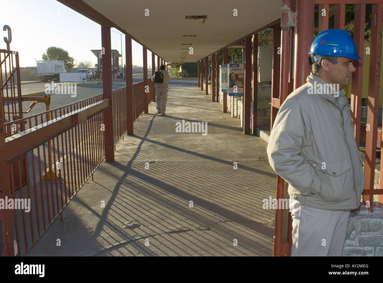 Workers enter the plant at the beginning of their shift at the PEMEX ...