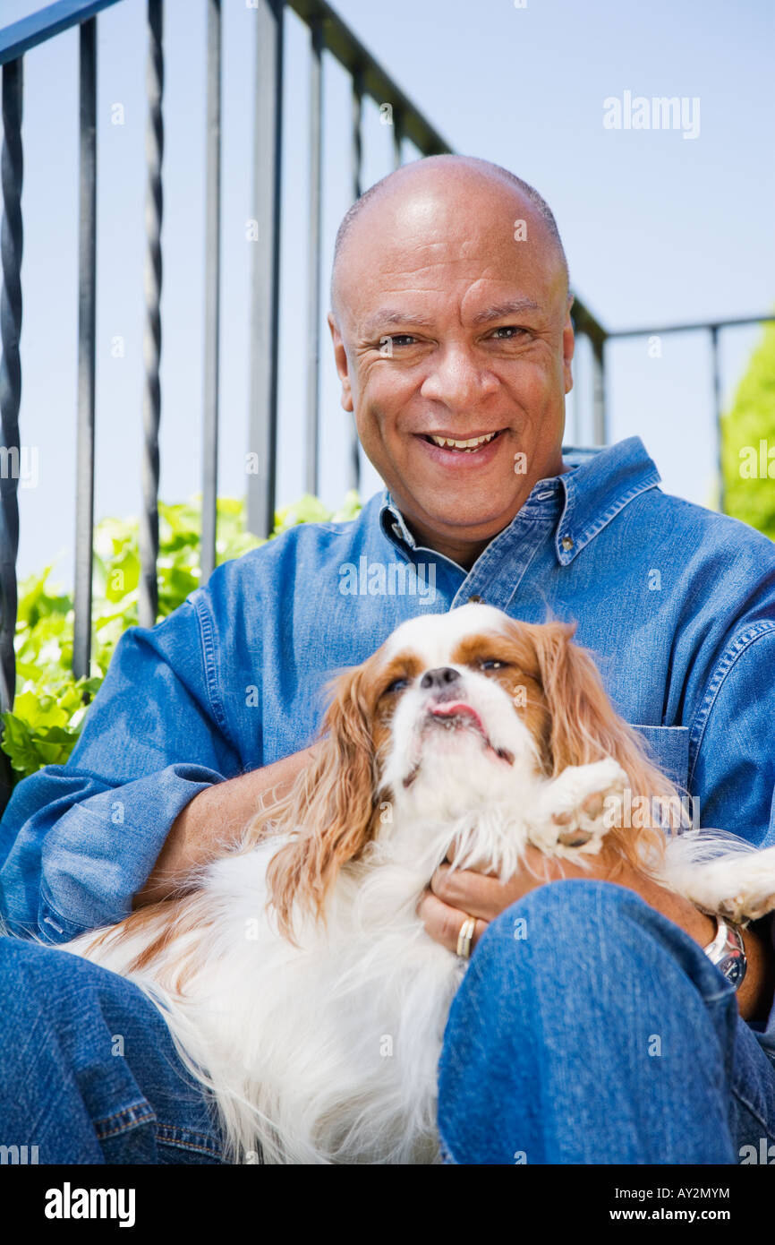Lap dog man hi-res stock photography and images - Alamy