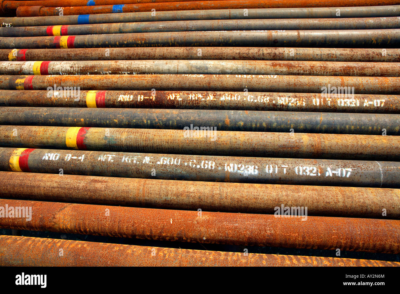 Drilling pipe stacked by an oil well in the Amazon Stock Photo - Alamy