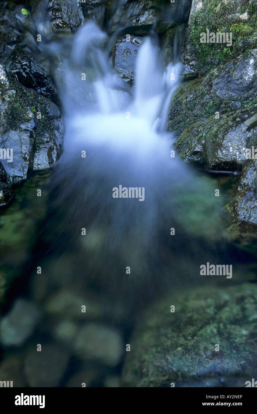 Water running over rocks Stock Photo - Alamy