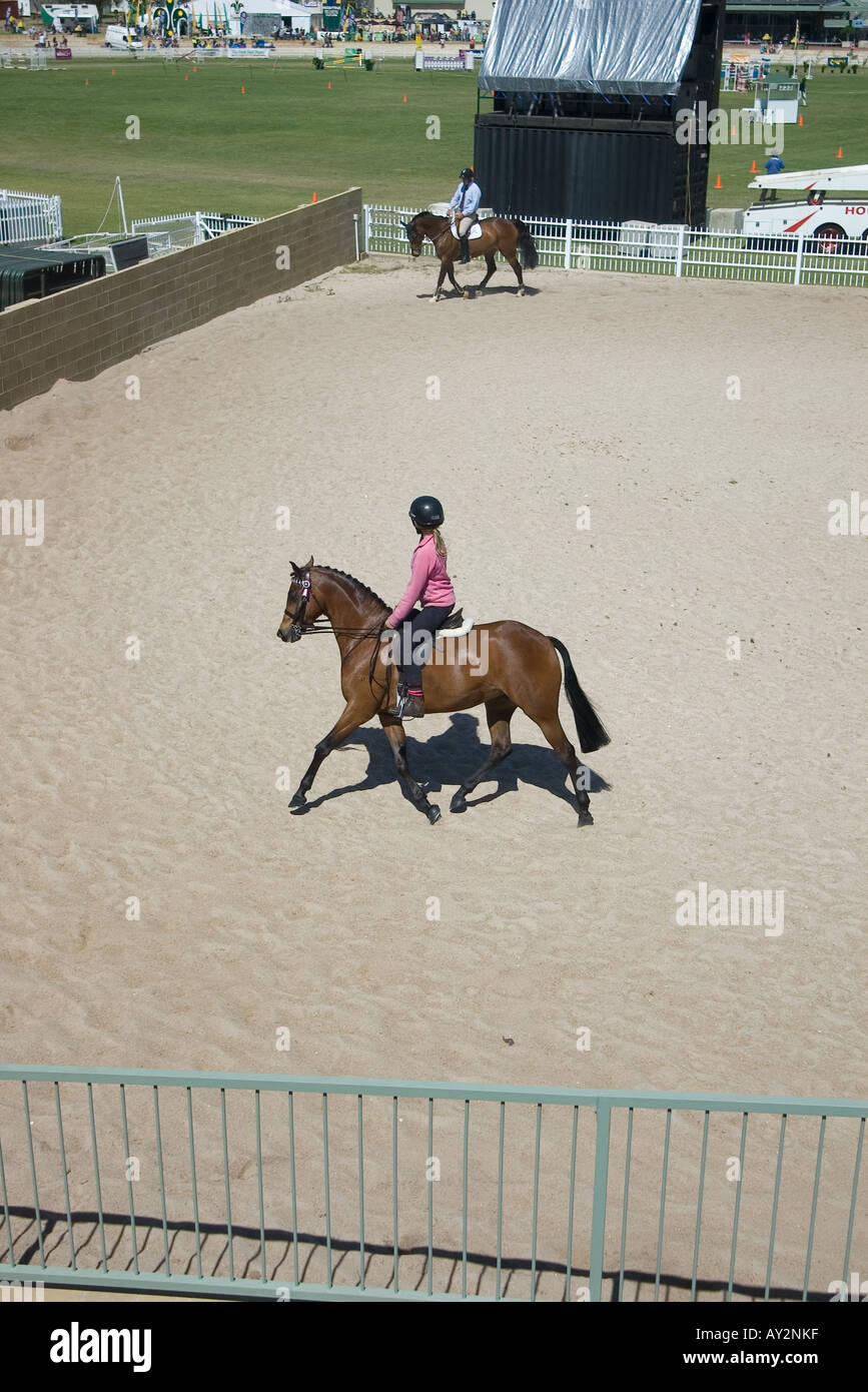 Girl practicing dressage in a ring Stock Photo - Alamy