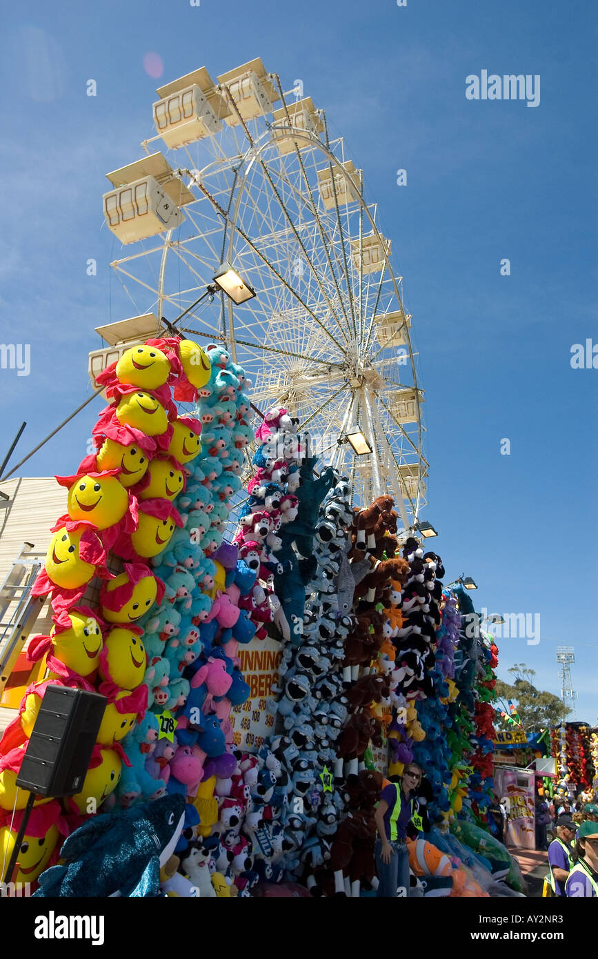 Crowds enjoying funfair rides in the sunshine, Royal Agricultural Show ...