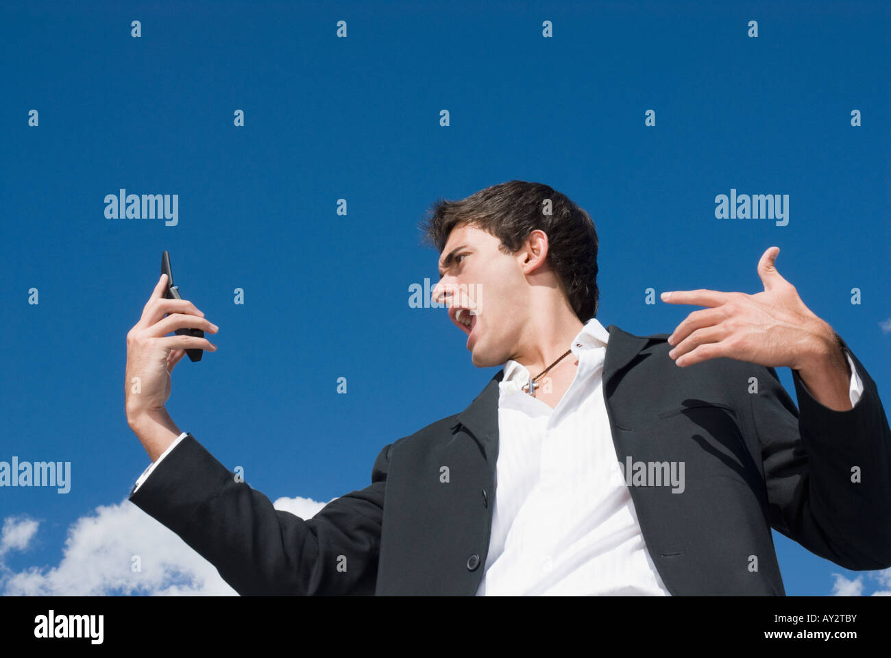 Yelling man profile suit hi-res stock photography and images - Alamy