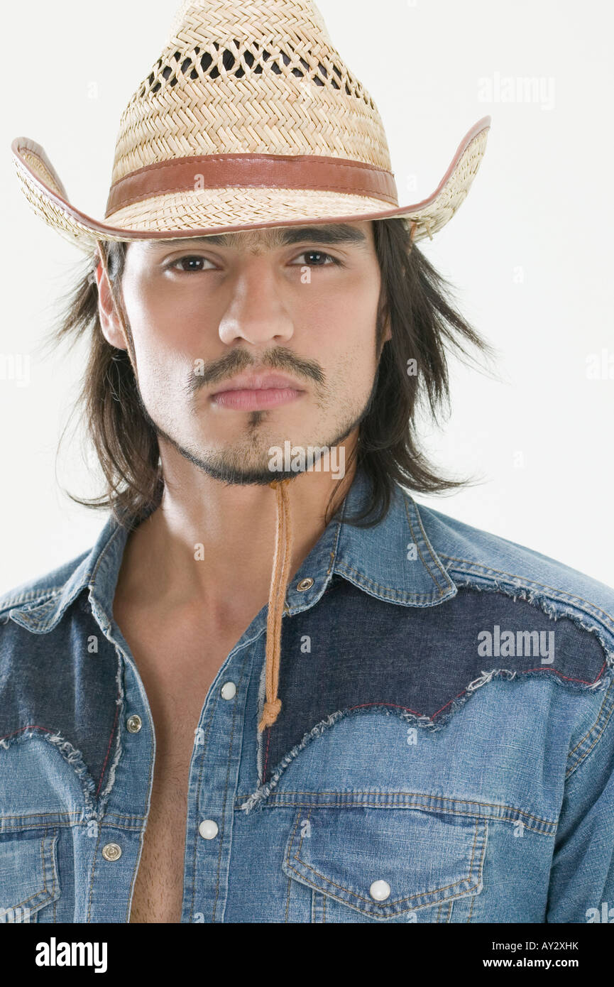 Hispanic man wearing cowboy hat Stock Photo - Alamy