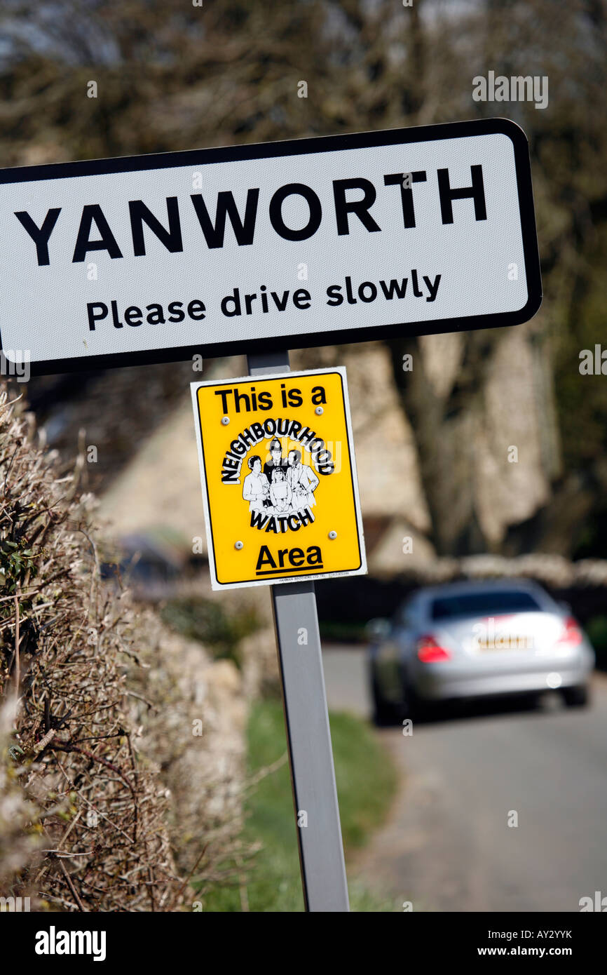 Village Name Sign and Neighbourhood Watch Sign Stock Photo - Alamy