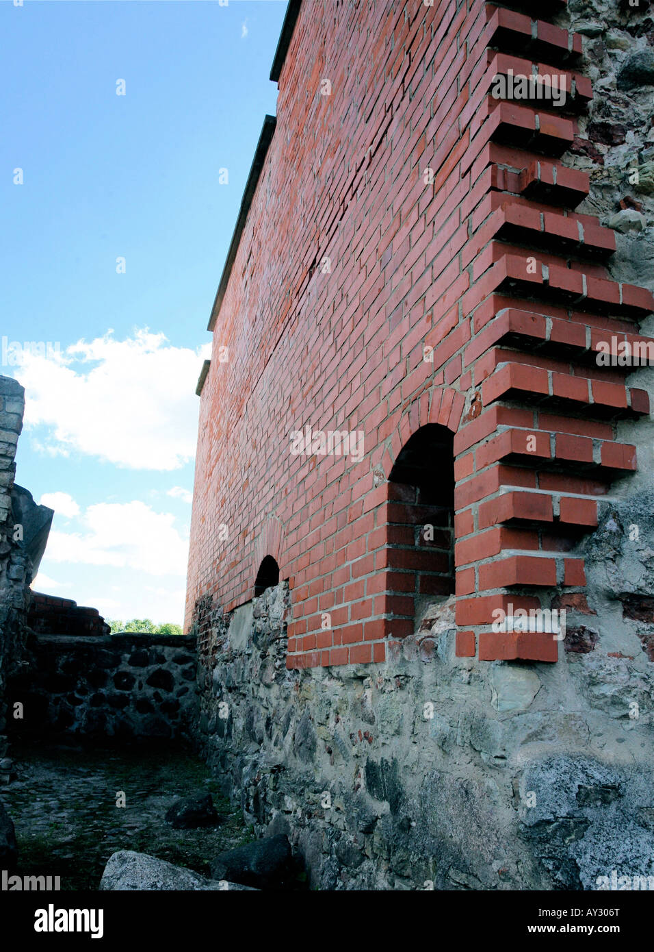 castle wall with original stone base and reconstructed top Stock Photo ...
