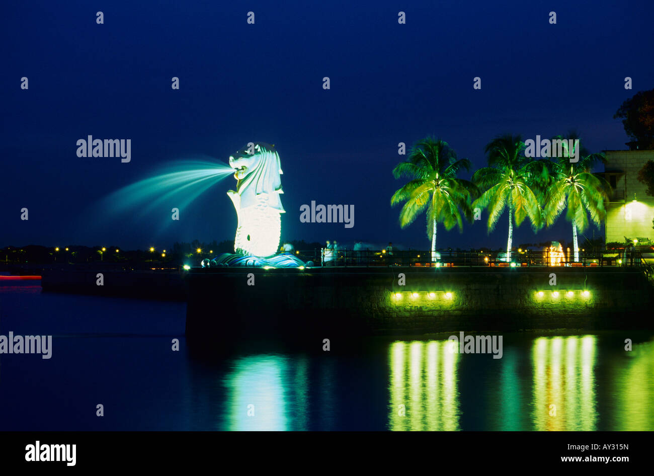 Merlion statue at night Singapore The Merlion half lion half fish is ...