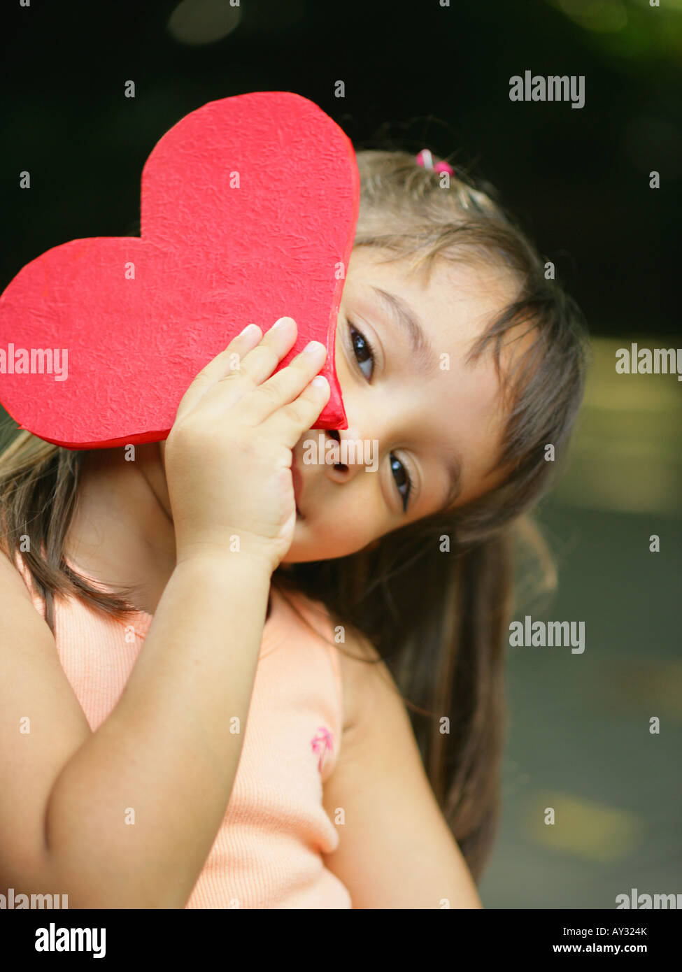 Cheerful indian girl heart shape hi-res stock photography and images ...