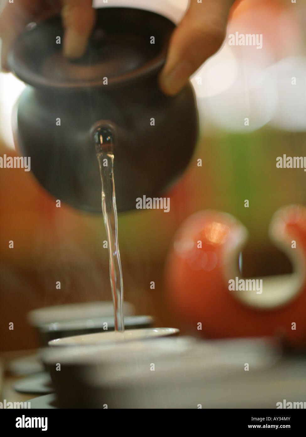 Holding teacups hi-res stock photography and images - Alamy