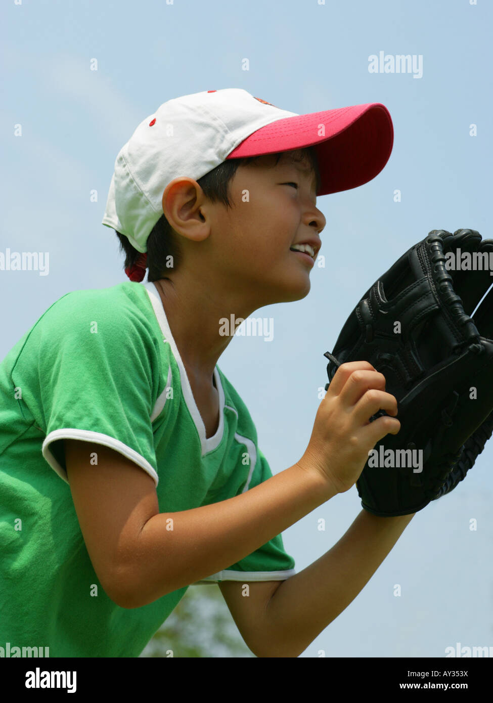 Close-up of a boy playing baseball Stock Photo - Alamy