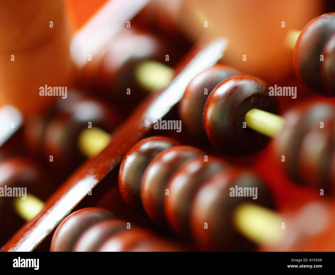 Close-up of a person's hand using a Chinese abacus Stock Photo - Alamy