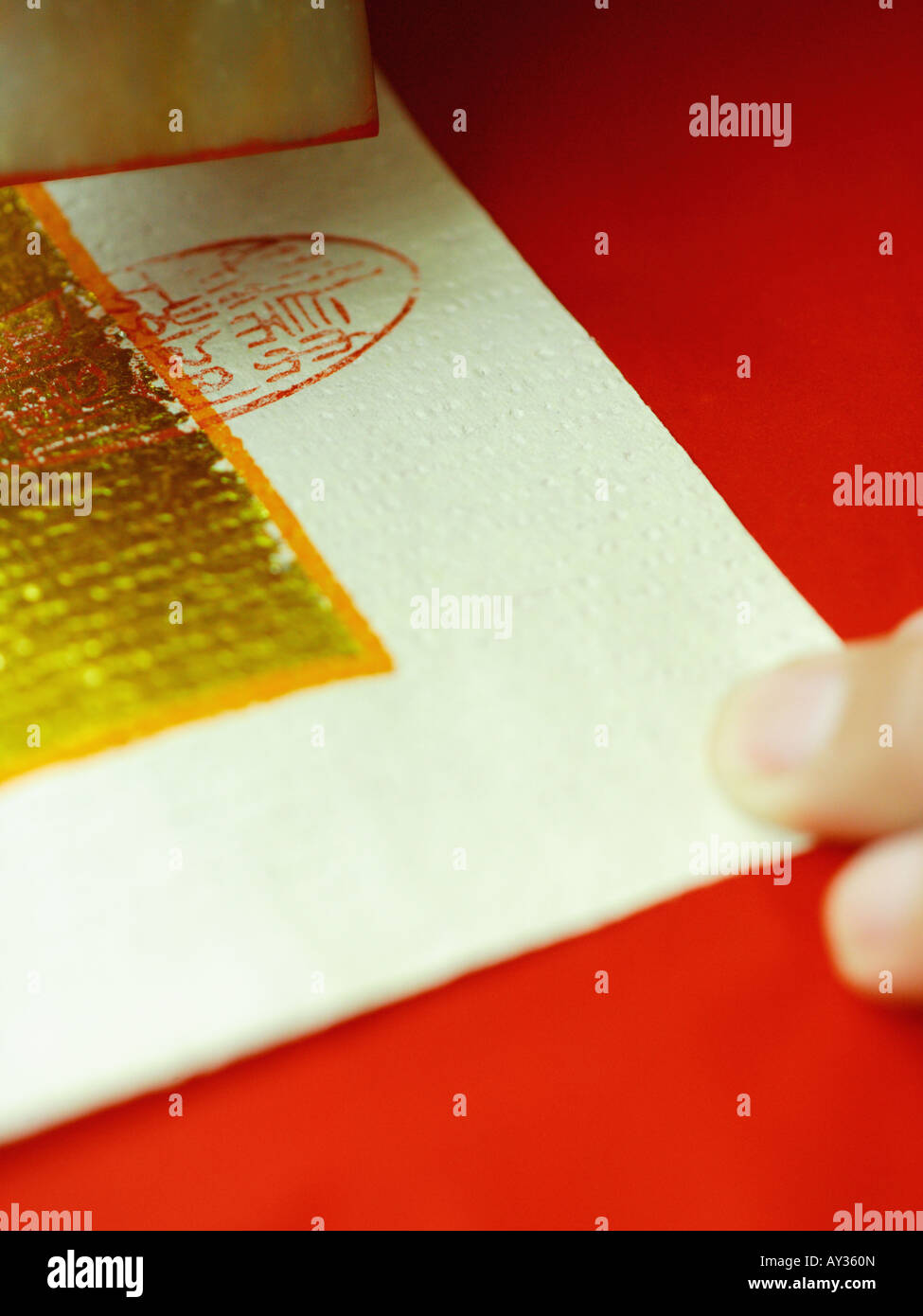 Close up persons hand using stamp hi-res stock photography and images ...