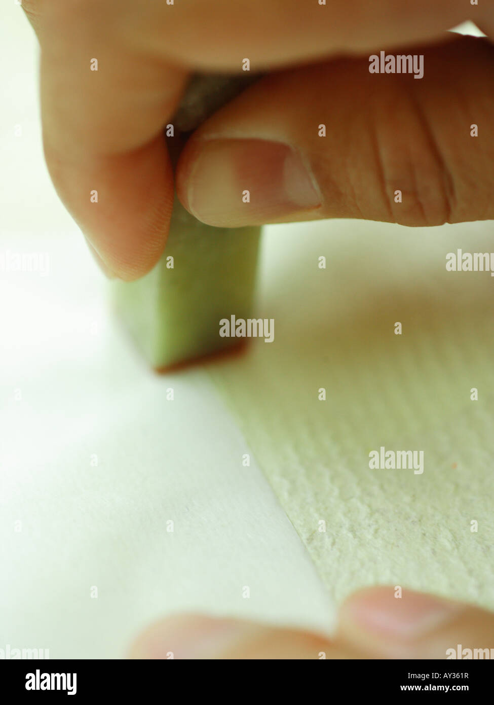 Close up persons hand using stamp hi-res stock photography and images ...