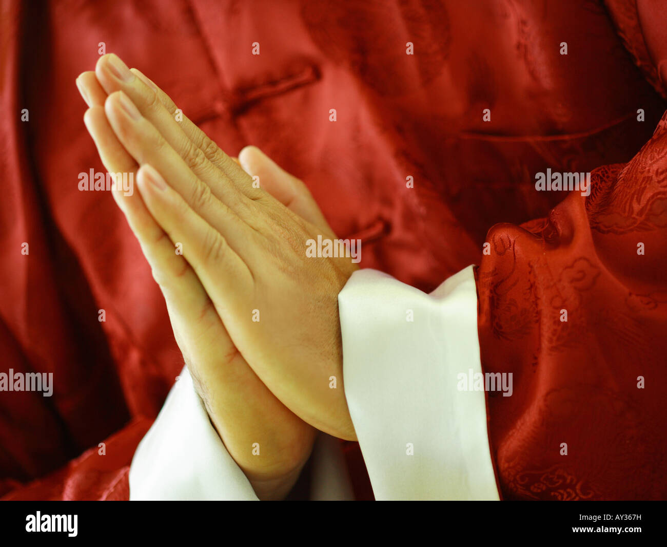 Mid section view of a man in a prayer position Stock Photo - Alamy