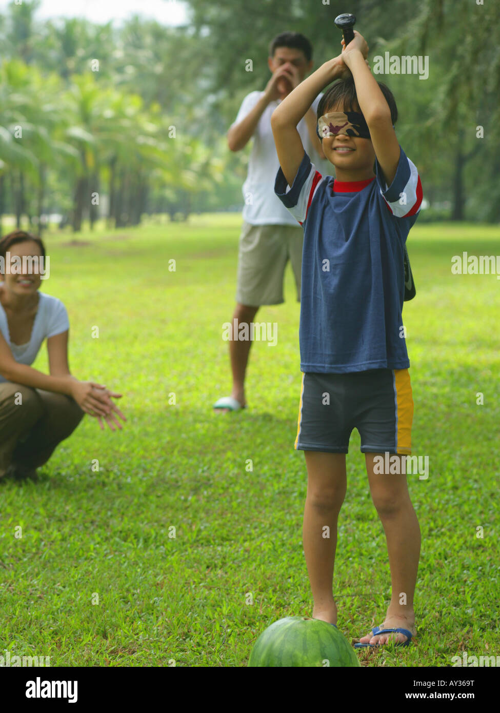 Boy holding a baseball bat hi-res stock photography and images - Alamy