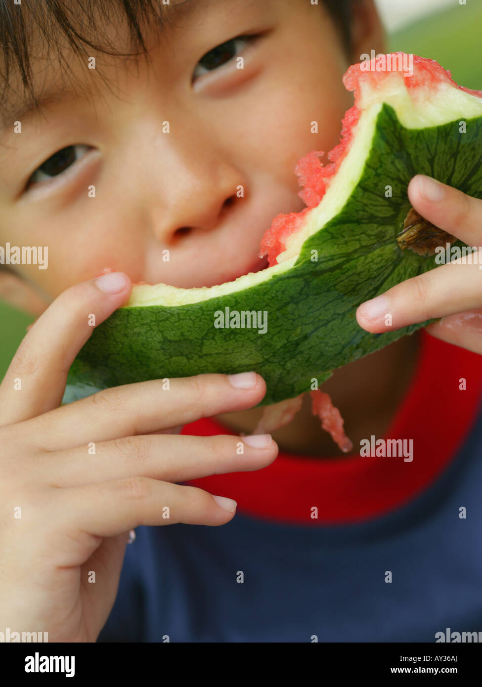 Close up boy holding watermelon hi-res stock photography and images - Alamy