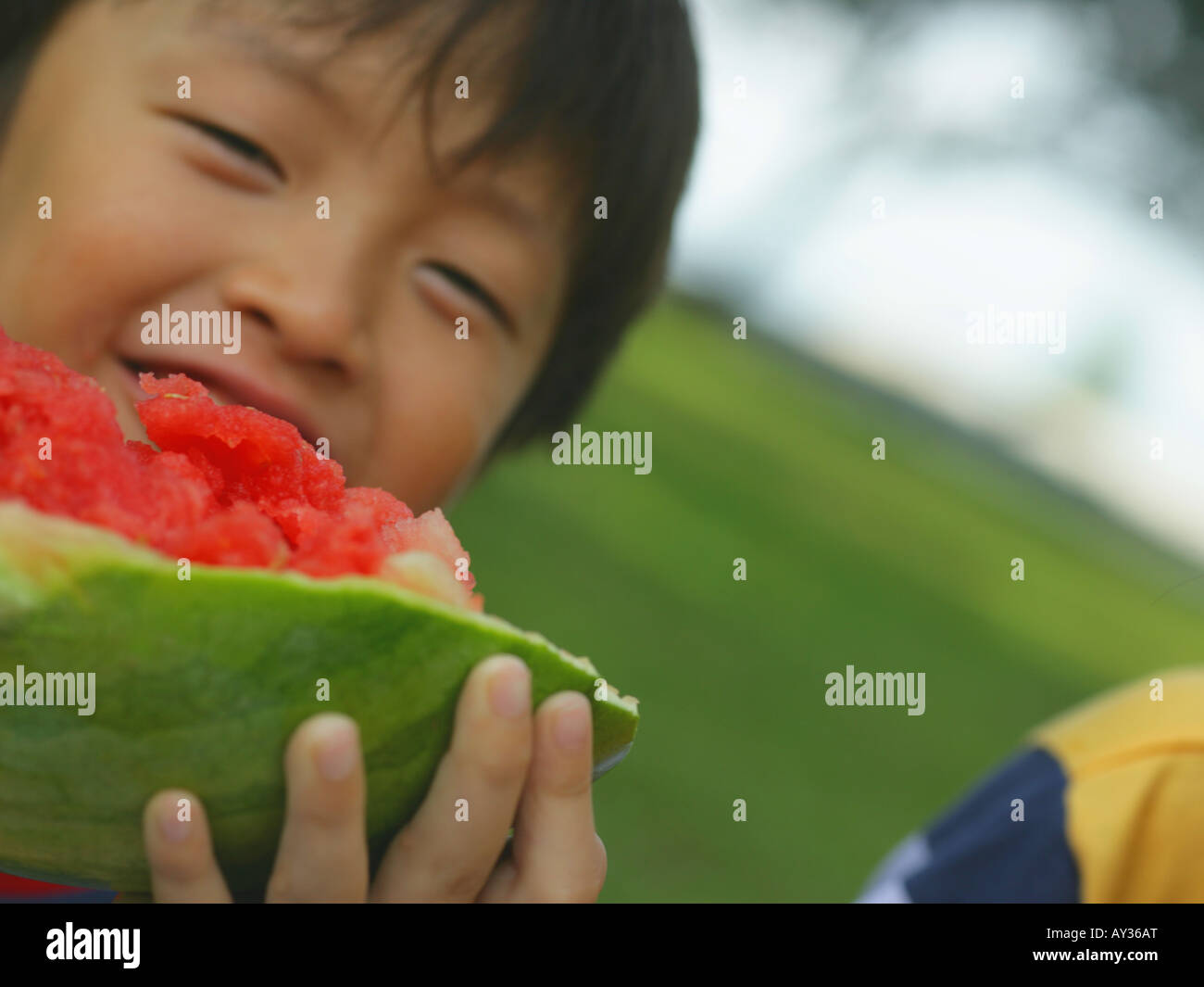 Close up boy holding watermelon hi-res stock photography and images - Alamy