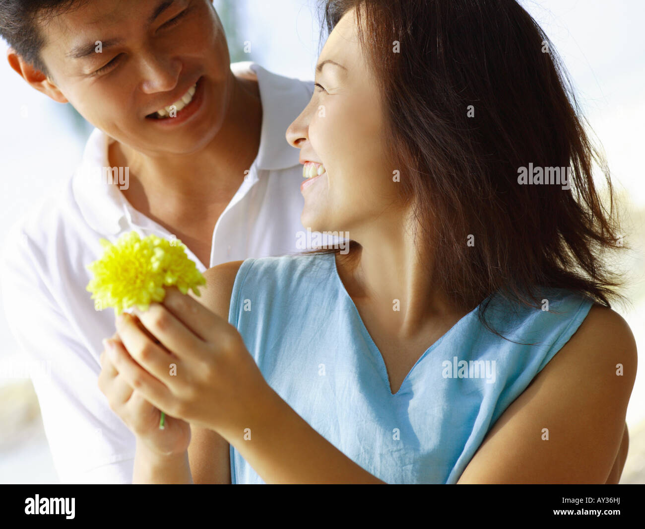 Mid adult couple looking up japanese hi-res stock photography and ...