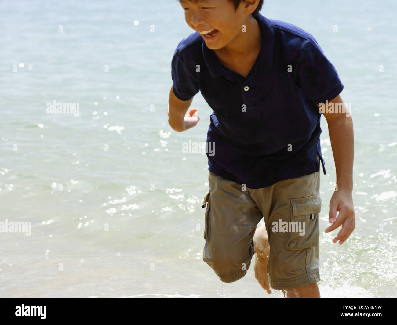 Profile of a boy smiling Stock Photo - Alamy