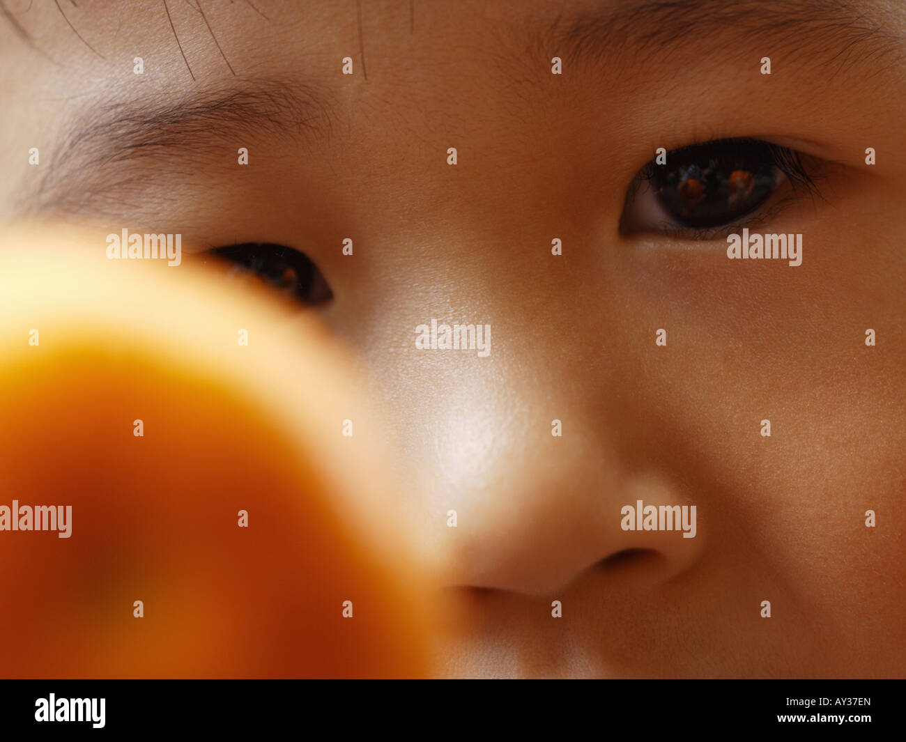 Close-up of a boy's face Stock Photo - Alamy