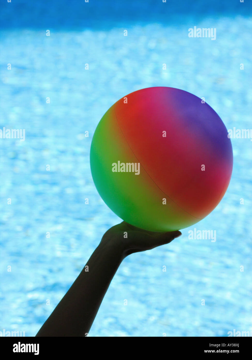 Close-up of a person's hand holding a beach ball Stock Photo - Alamy