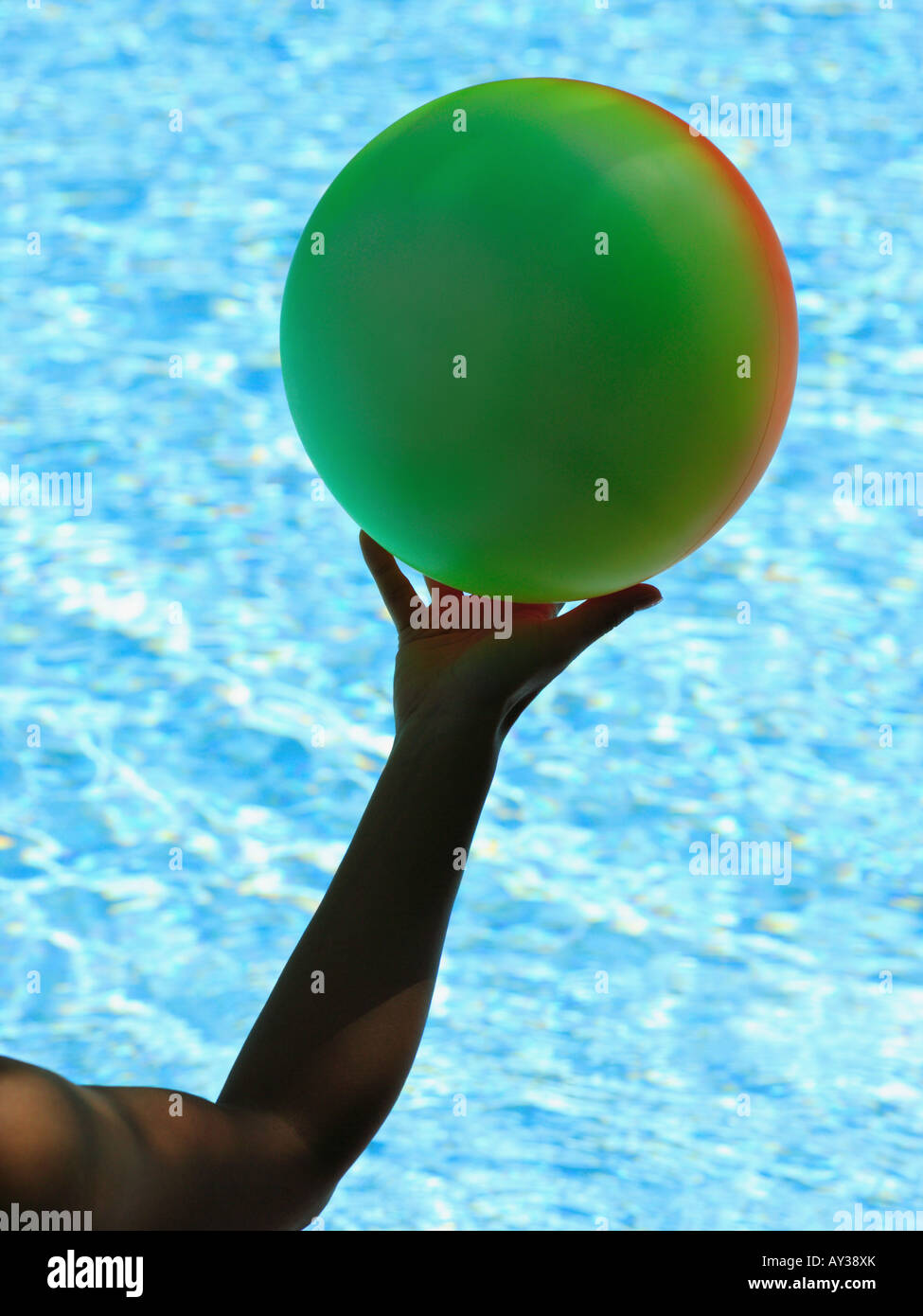 Close-up of a person's hand holding a beach ball Stock Photo - Alamy