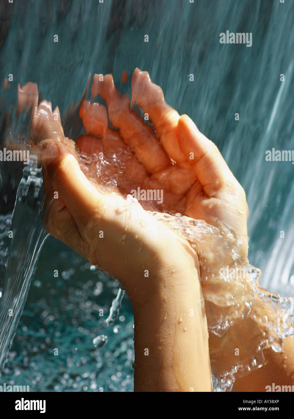 Close-up of a person's hands cupped in water Stock Photo - Alamy