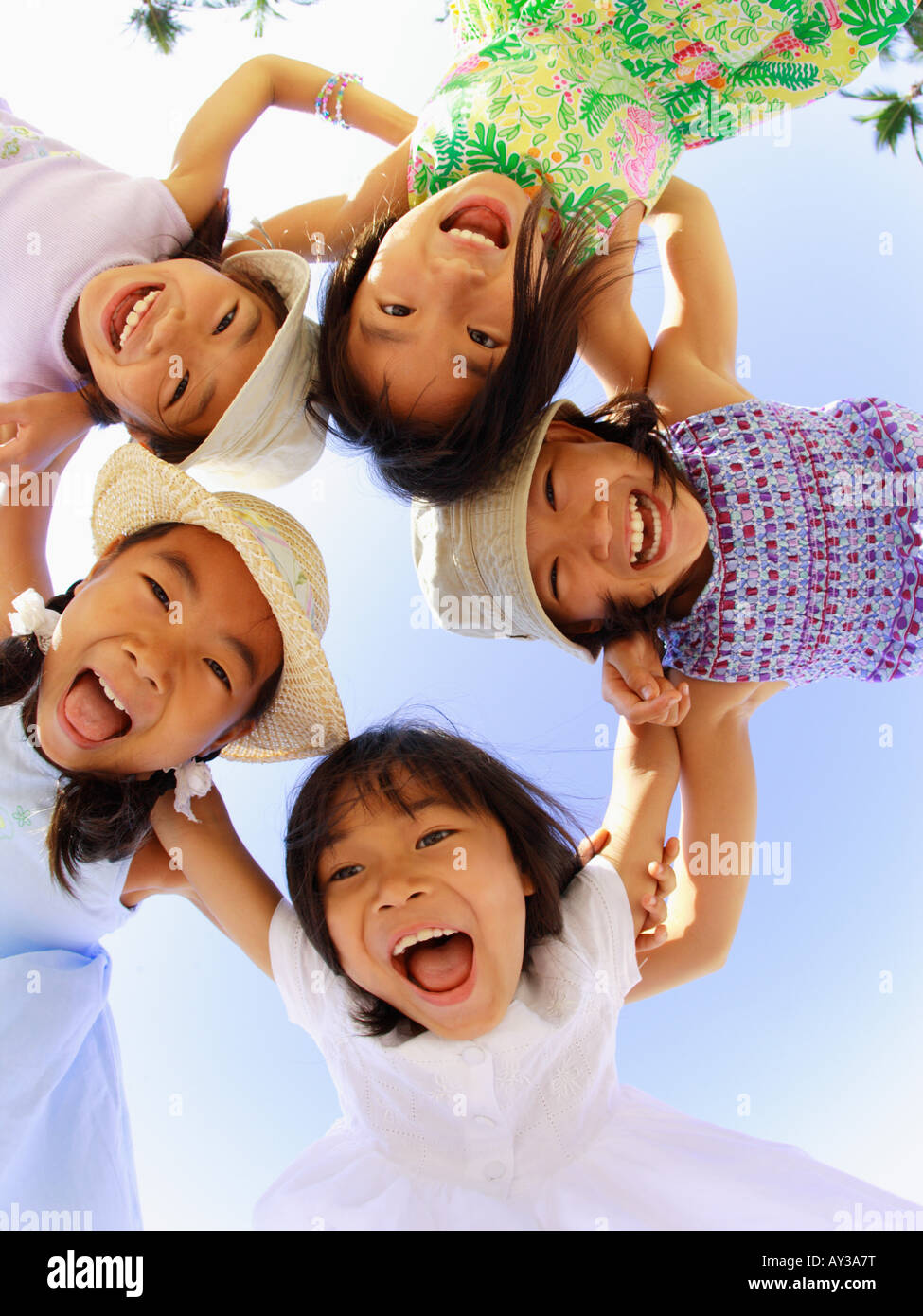 Girls in huddle looking at camera hi-res stock photography and images ...